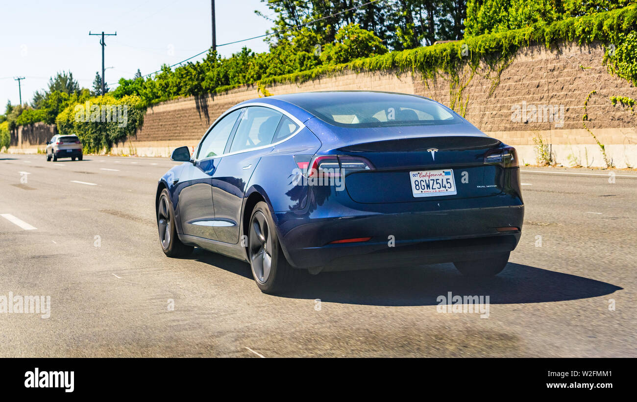 Tesla model 3 electric car on road hi-res stock photography and images ...
