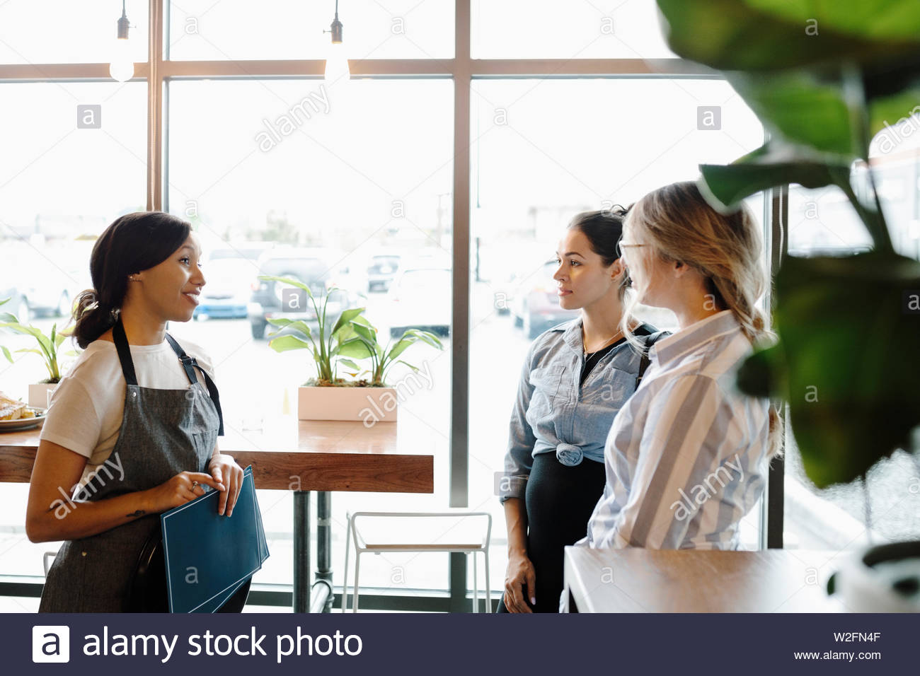 Customer arriving restaurant hi-res stock photography and images - Alamy