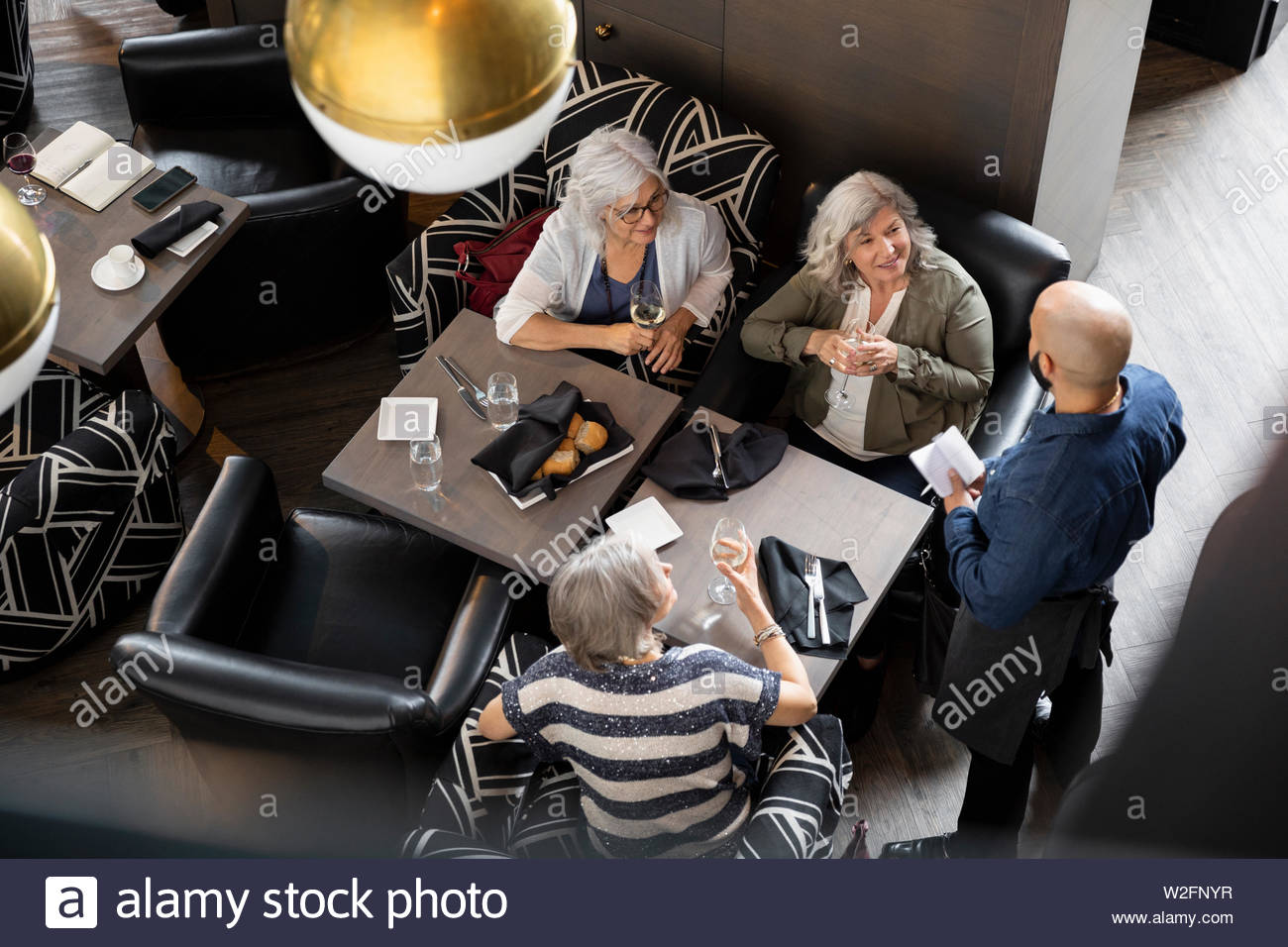Group of seniors in bar men women hi-res stock photography and images ...