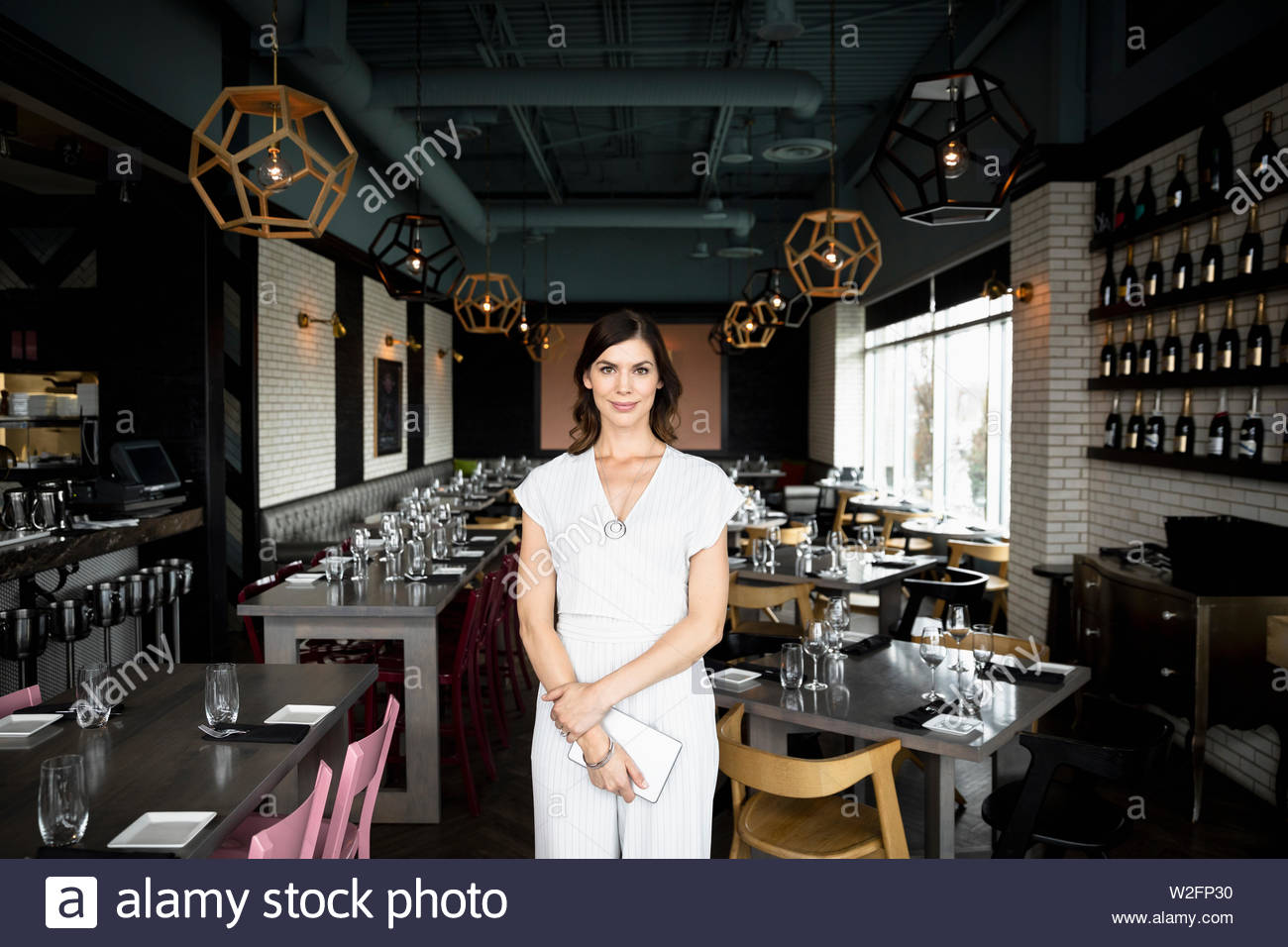 Restaurant hostess hi-res stock photography and images - Alamy