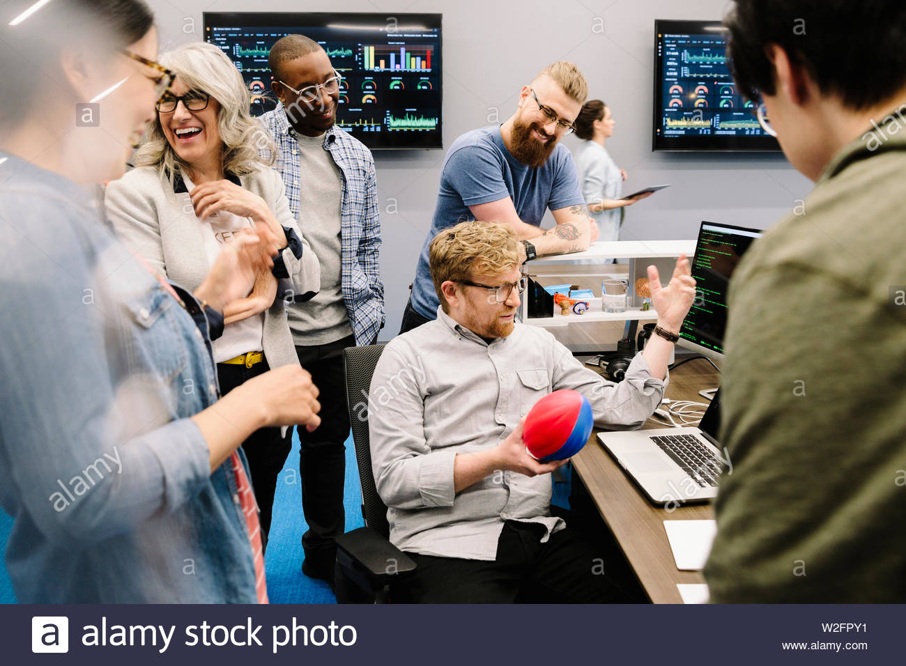 Programmer explaining hi-res stock photography and images - Alamy