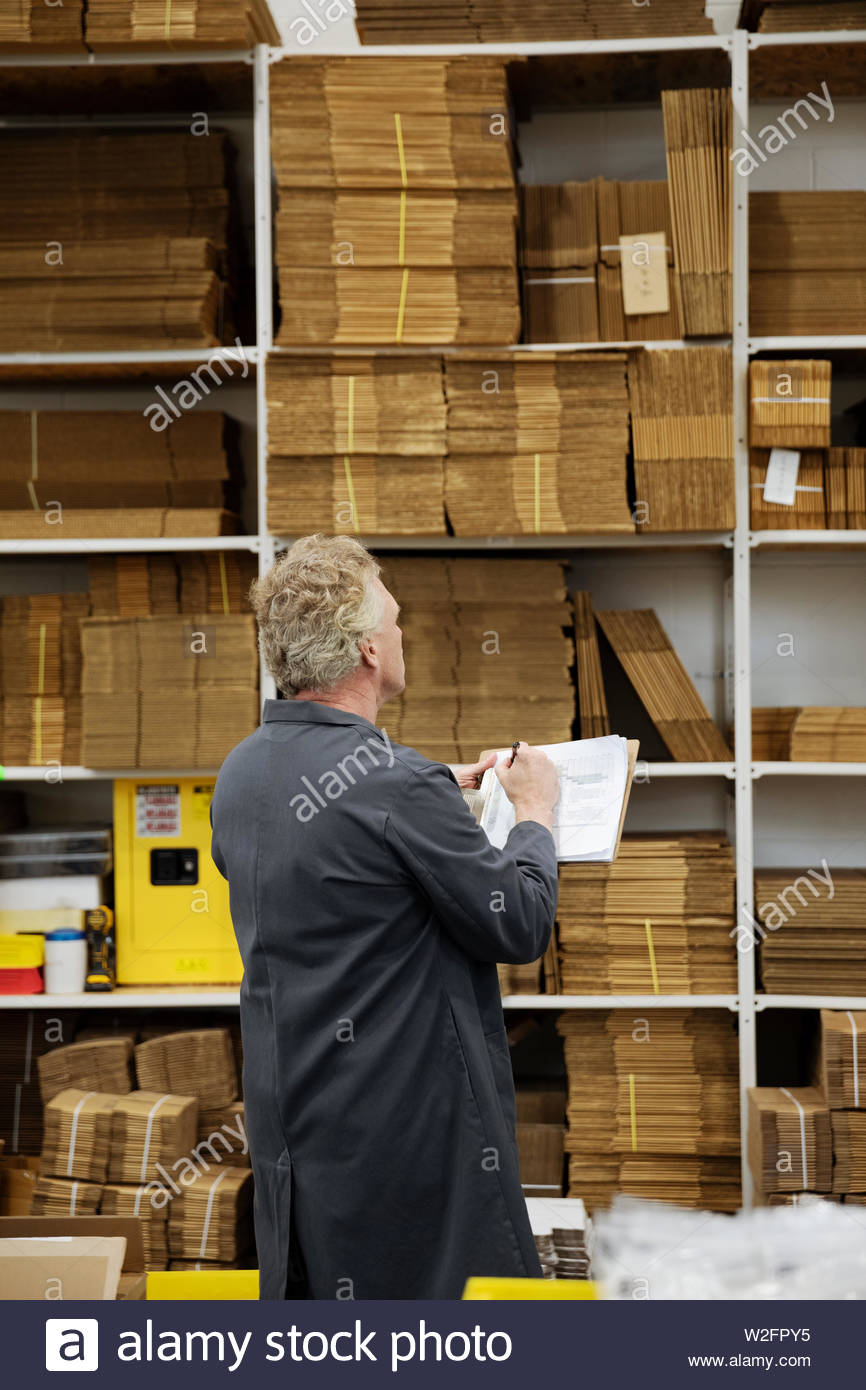 Man taking inventory hi-res stock photography and images - Alamy