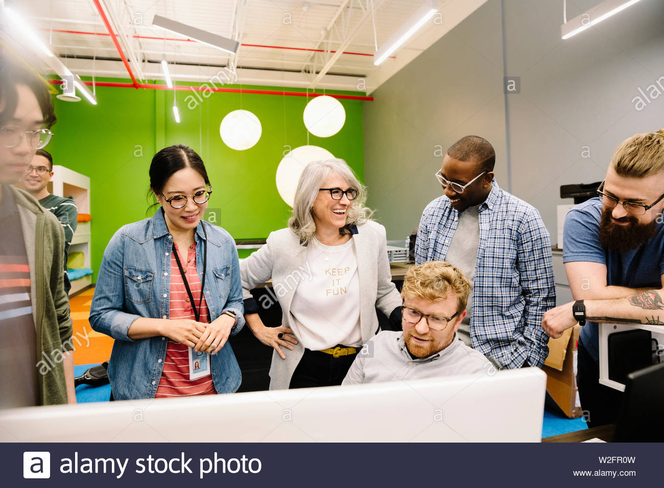 Computer programmers discussing hi-res stock photography and images - Alamy