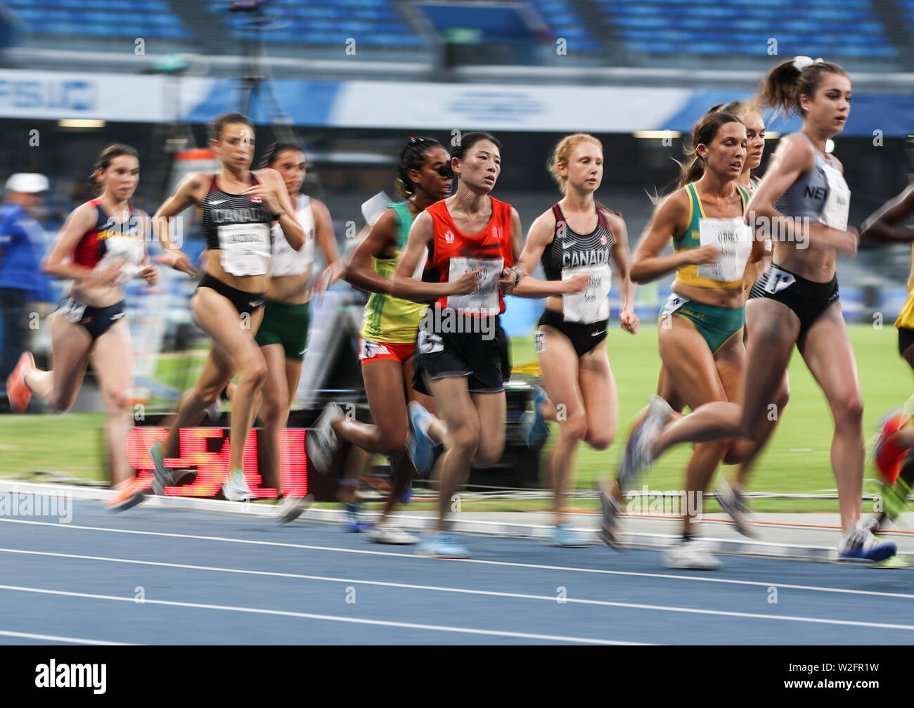 Naples, Italy. 8th July, 2019. Zhang Deshun (C) of China competes ...