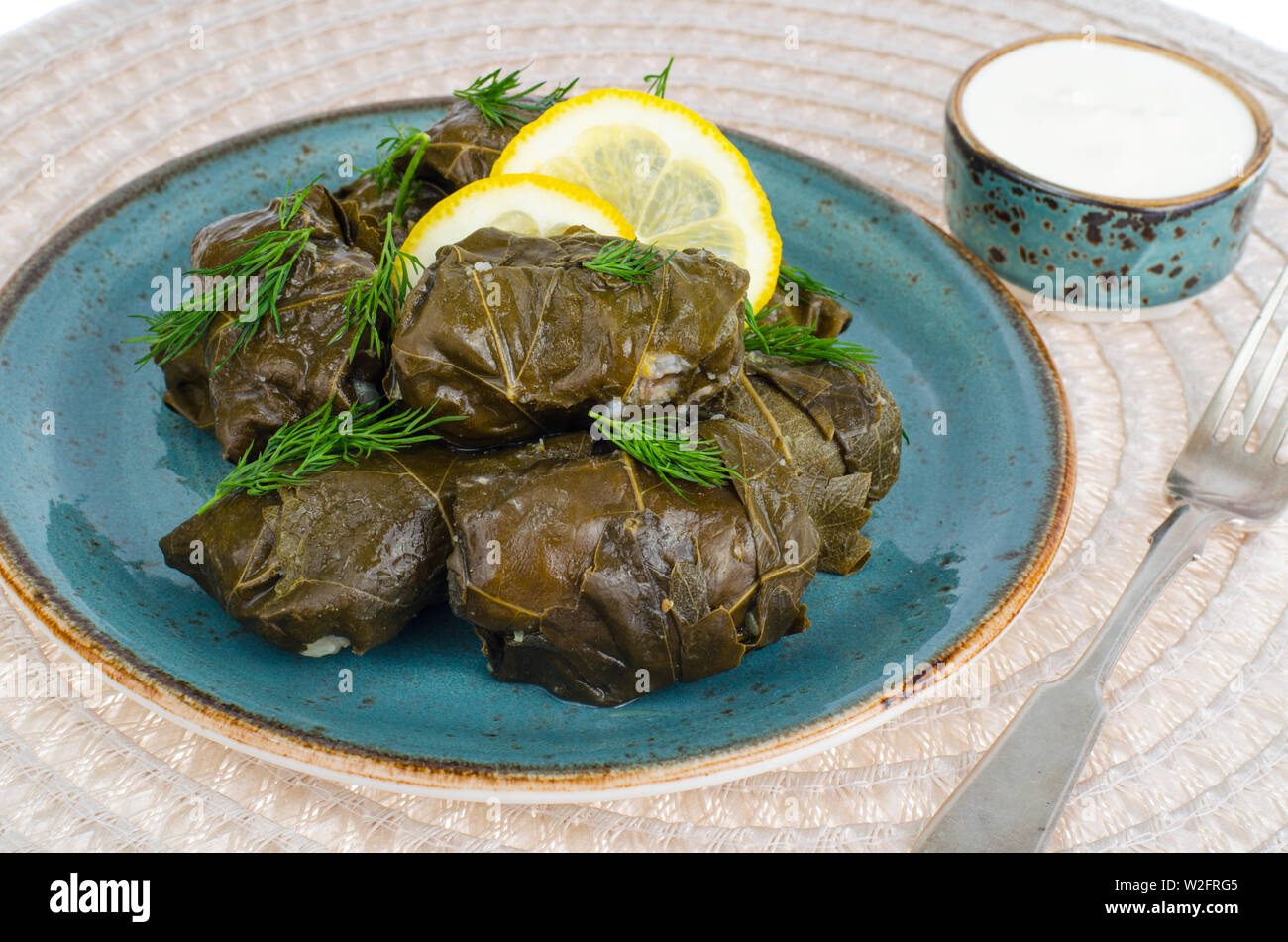 Dolma with meat, rice in grape leaves Stock Photo - Alamy