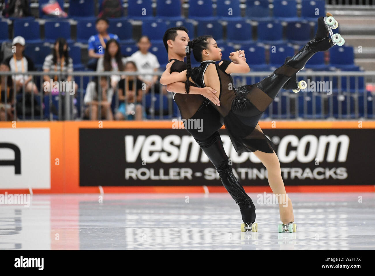 SHAO-JIE LEE-SHAO-KUAN LEE from Taipei, performing in Junior Pairs ...
