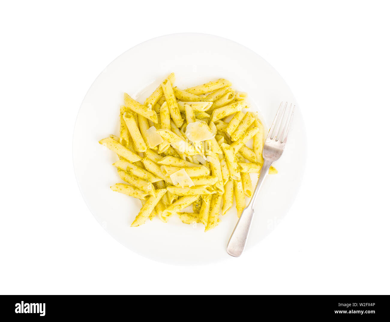 White plate with pasta and pesto Stock Photo - Alamy