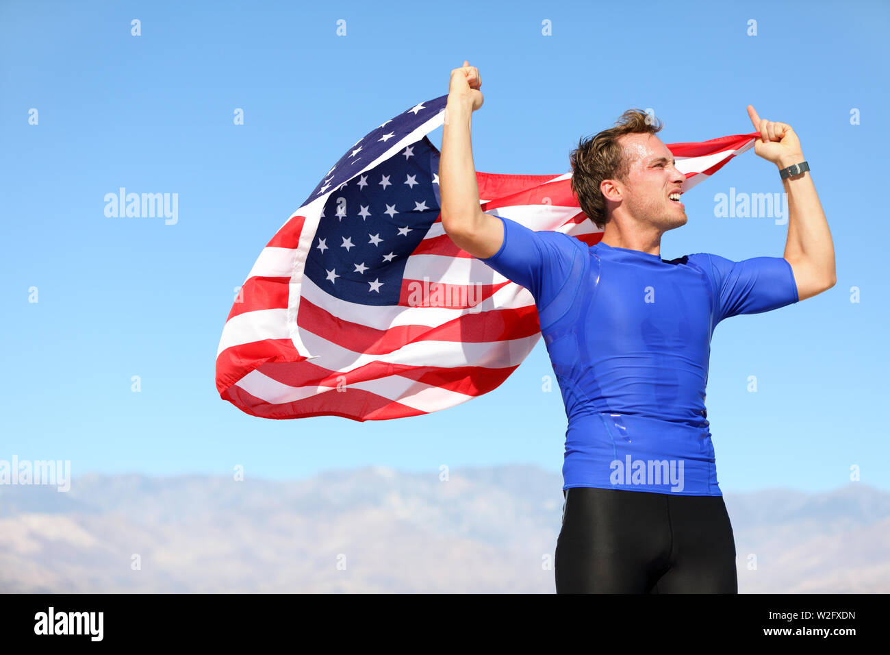 Success - winner athlete cheering with USA flag celebrating victory ...