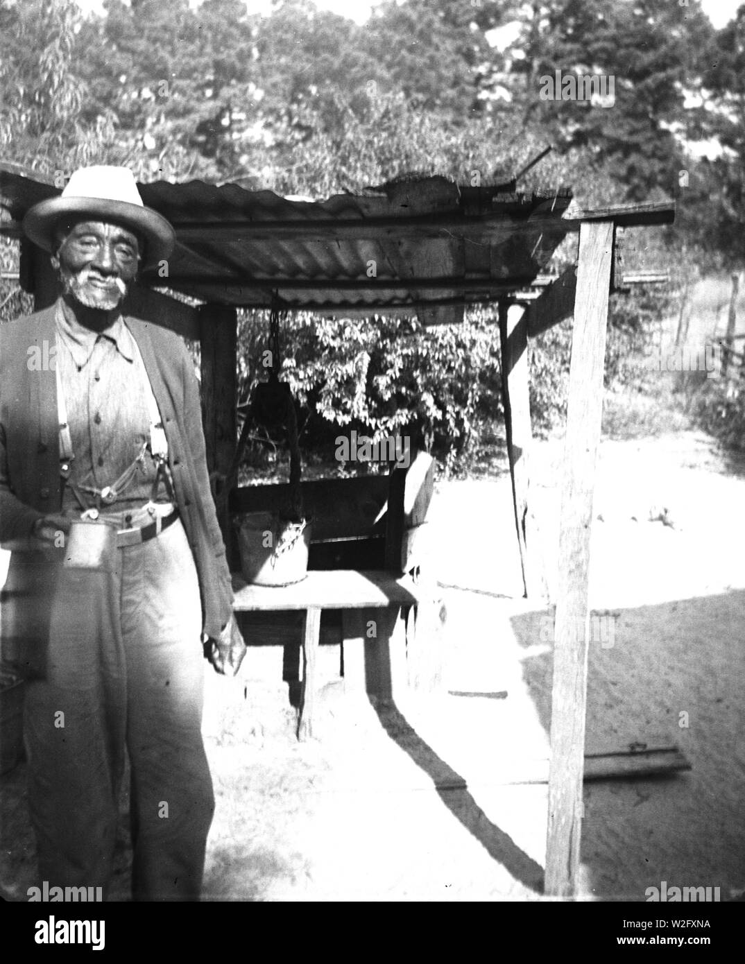 Uncle Billy McCrea, Jasper, Texas, standing at his well ca. September ...