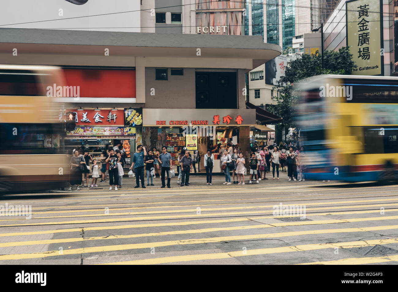 Causeway Bay, Hong Kong, 08 July 2019: Commuter in busy crosswalk ...