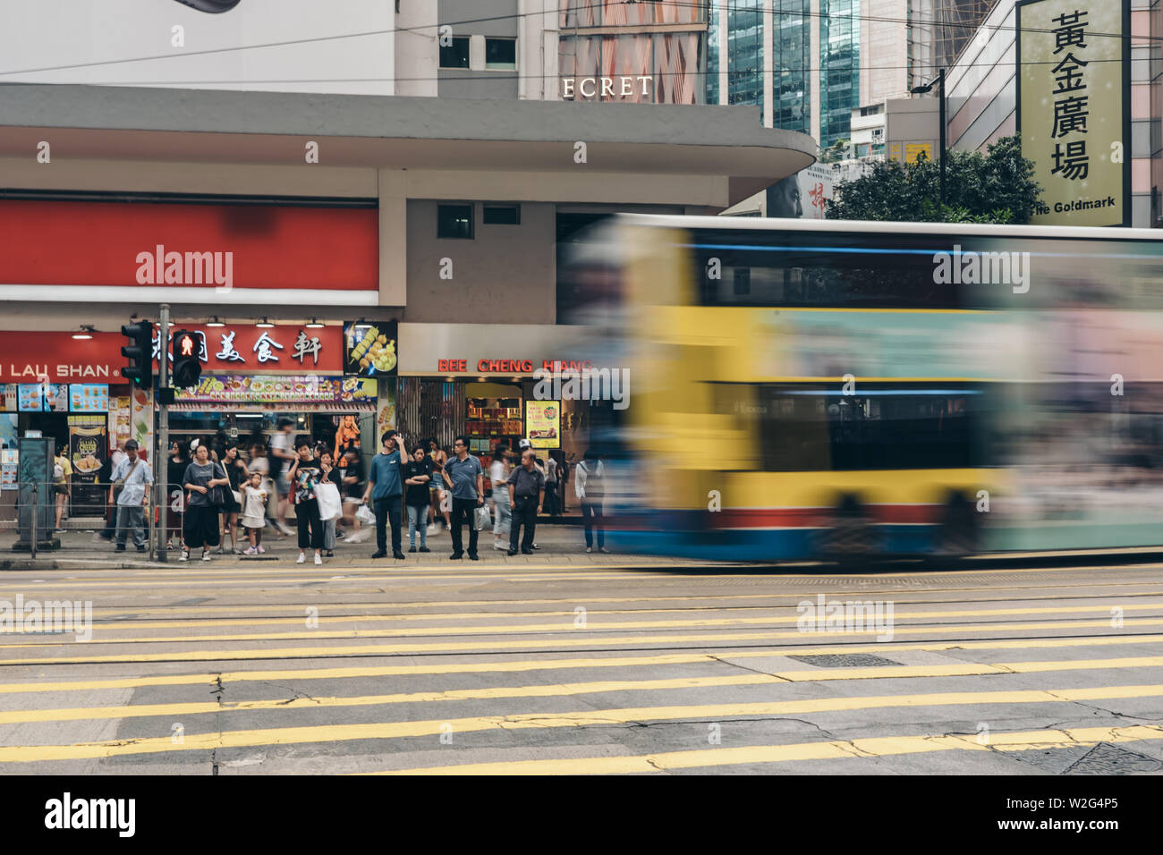 Causeway Bay, Hong Kong, 08 July 2019: Commuter in busy crosswalk ...