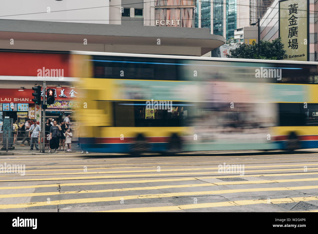 Causeway Bay, Hong Kong, 08 July 2019: Commuter in busy crosswalk ...