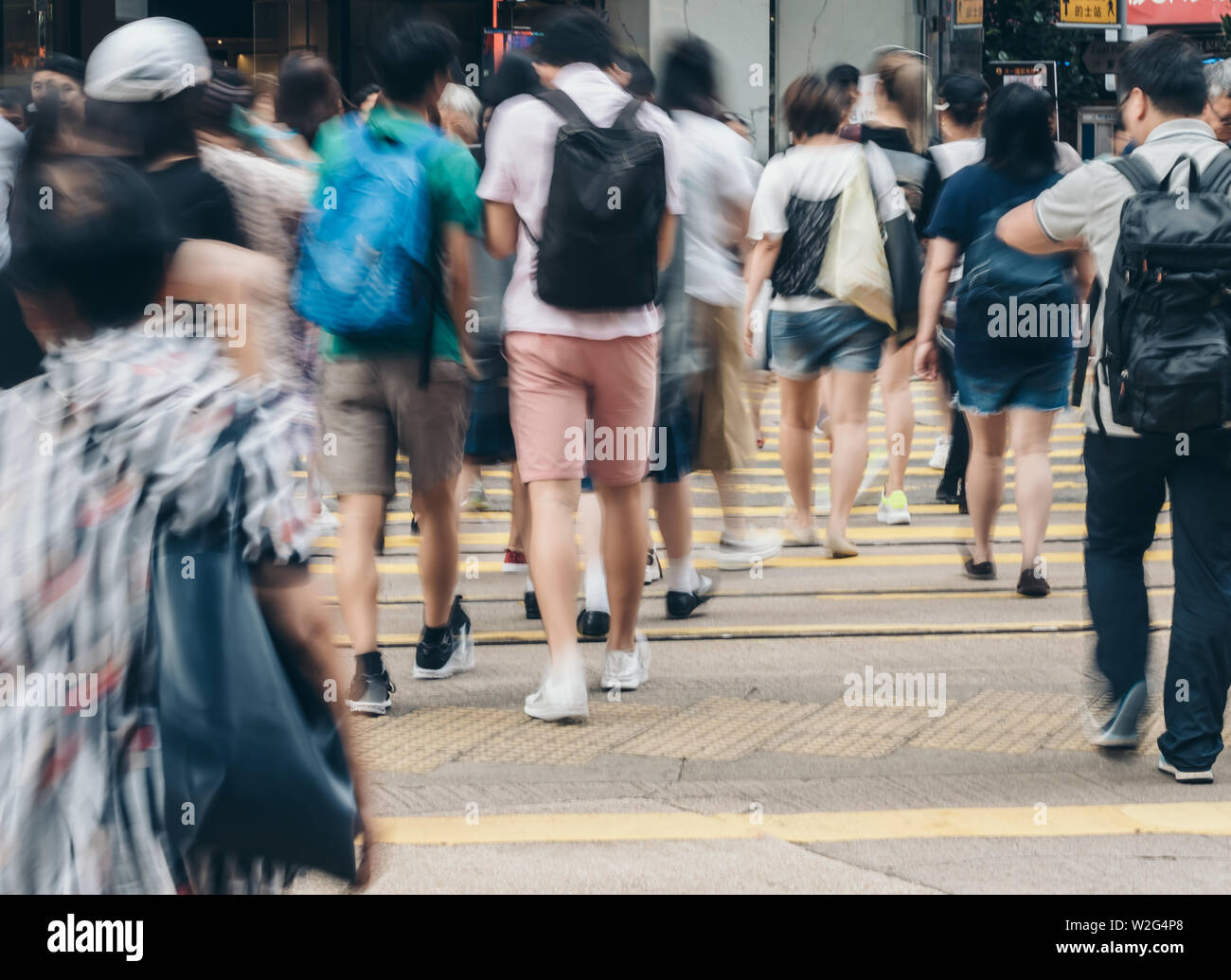 Causeway Bay, Hong Kong, 08 July 2019: Commuter in busy crosswalk ...