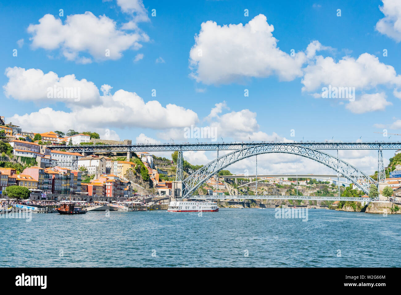 view of Dom Luis Bridge in Porto in a beautiful summer day, Portugal ...