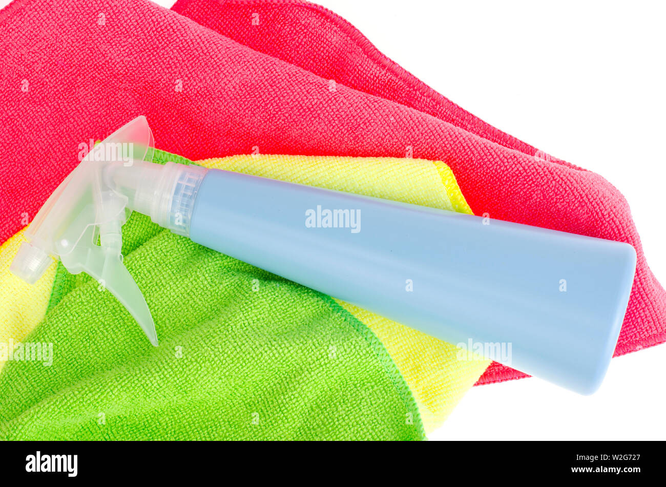 Blue bottle spray on bright background Stock Photo - Alamy