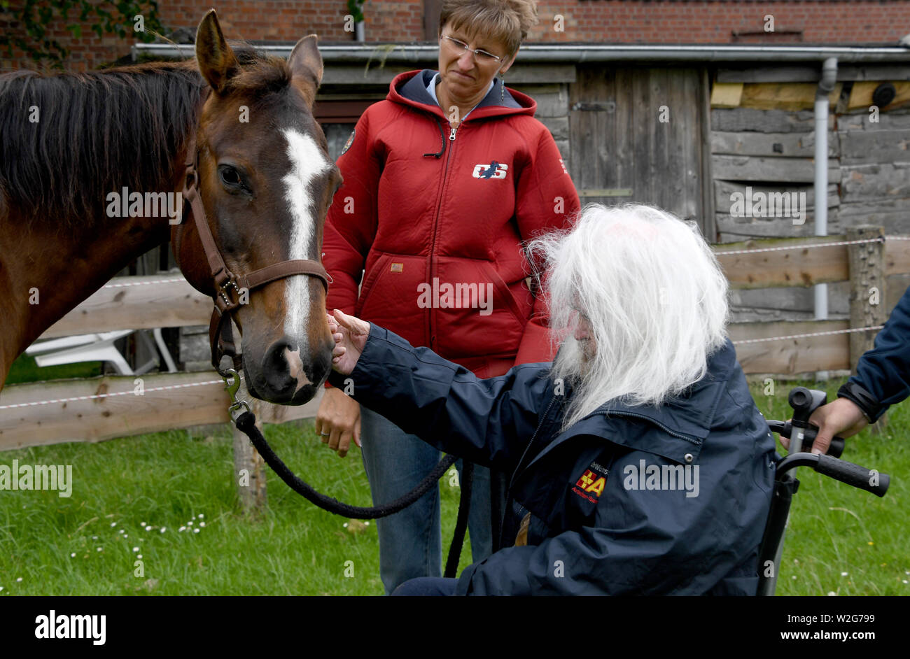 Wesselburen, Germany. 27th June, 2019. 82-year-old Edzard Riek strokes ...
