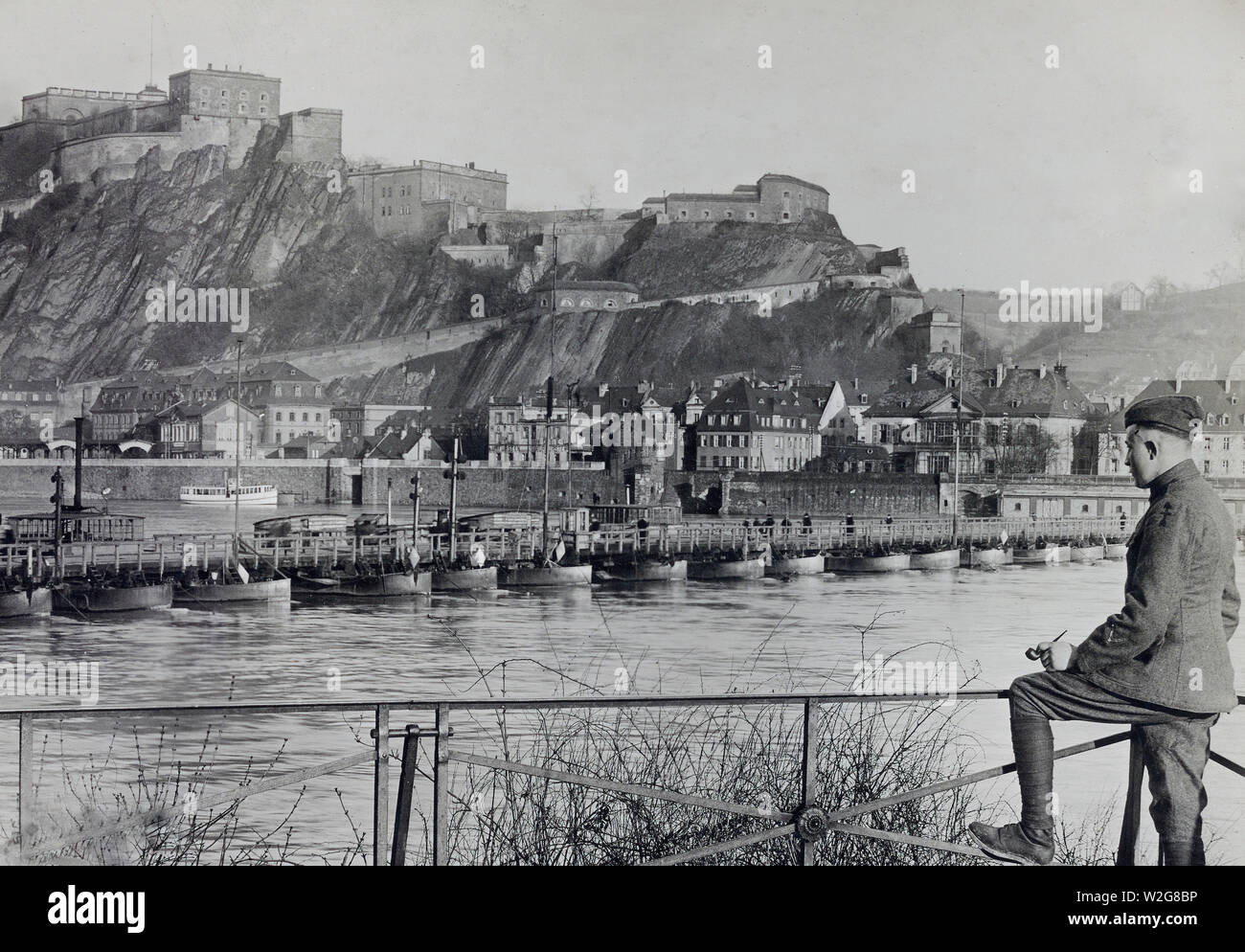 In the foreground is a pontoon bridge called the Bridge of Boats Stock ...