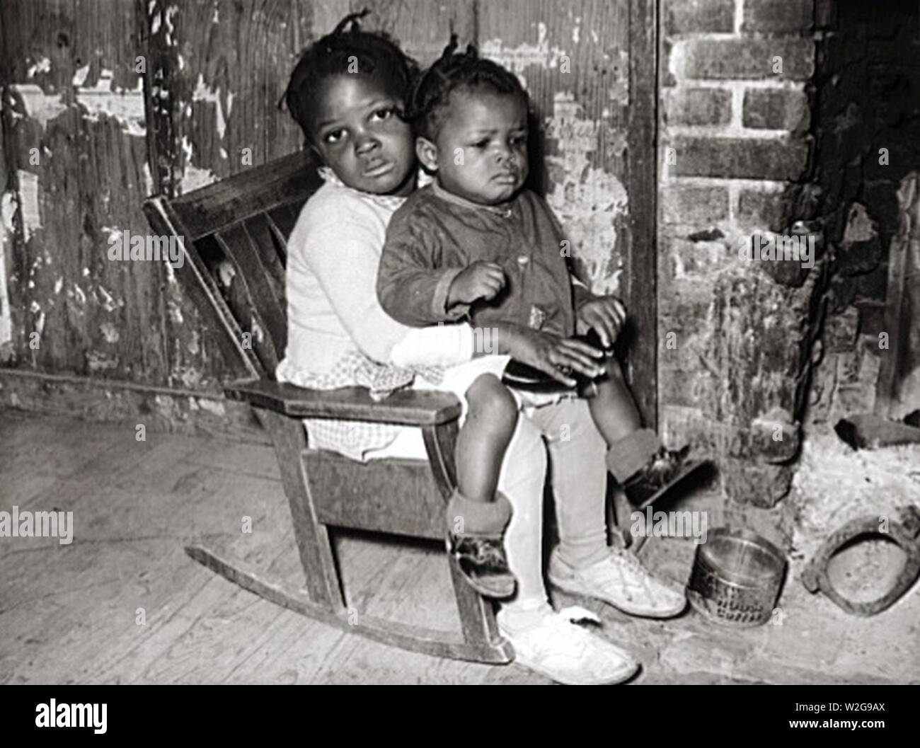 Children in rocking chair, Louisiana Stock Photo - Alamy