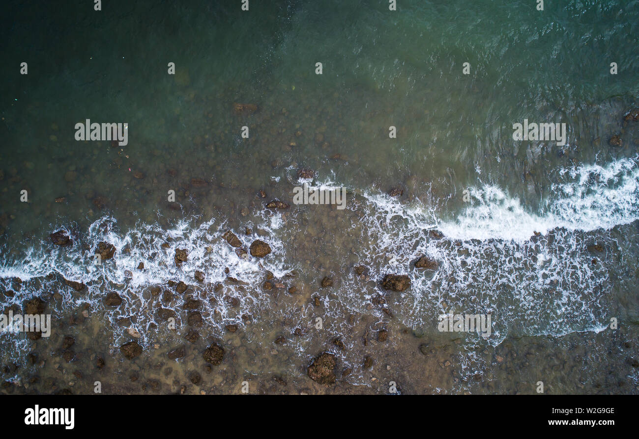 Aerial top view of ocean waves and Rock coast Stock Photo - Alamy