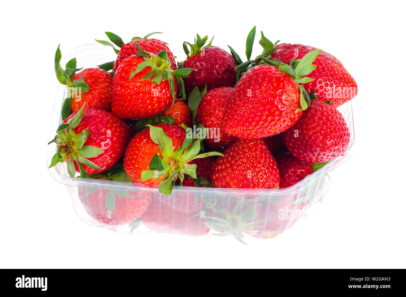 Fresh sweet red strawberries in plastic container Stock Photo - Alamy