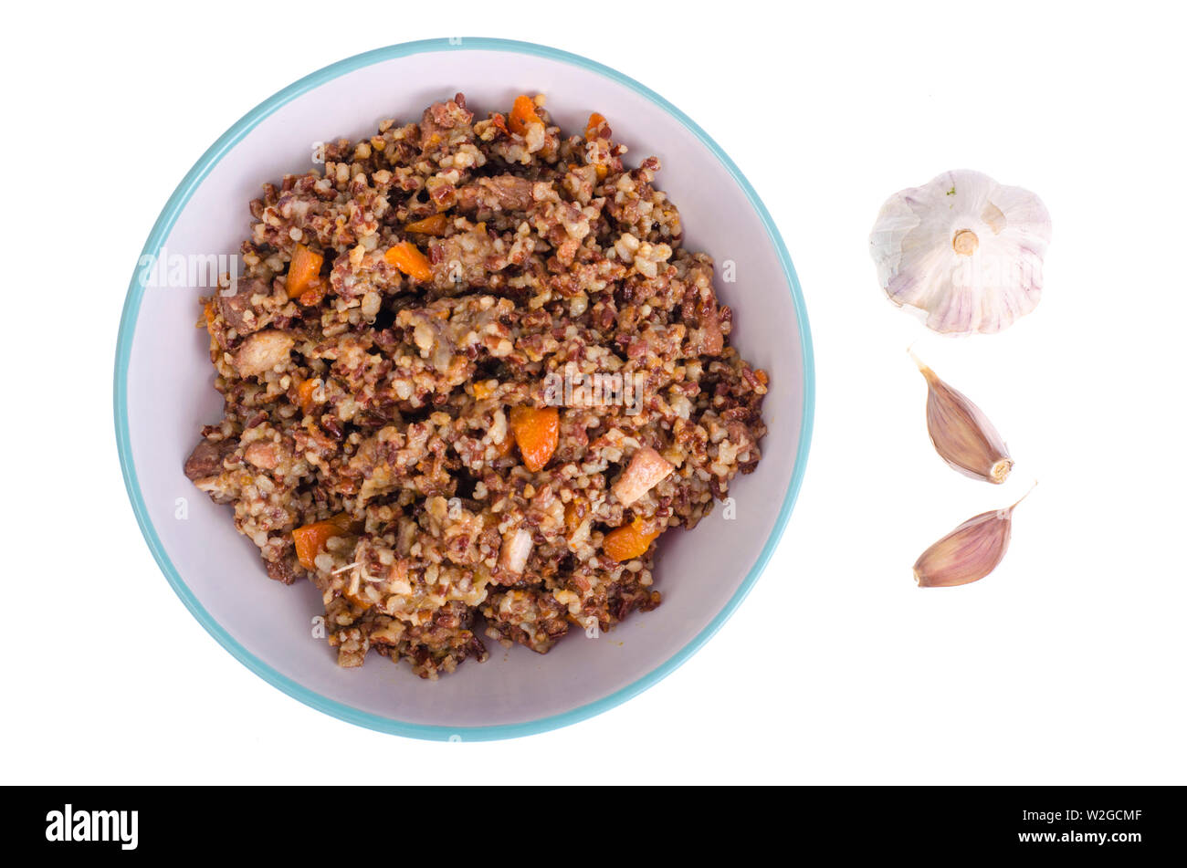 Red rice porridge with meat and vegetables Stock Photo - Alamy