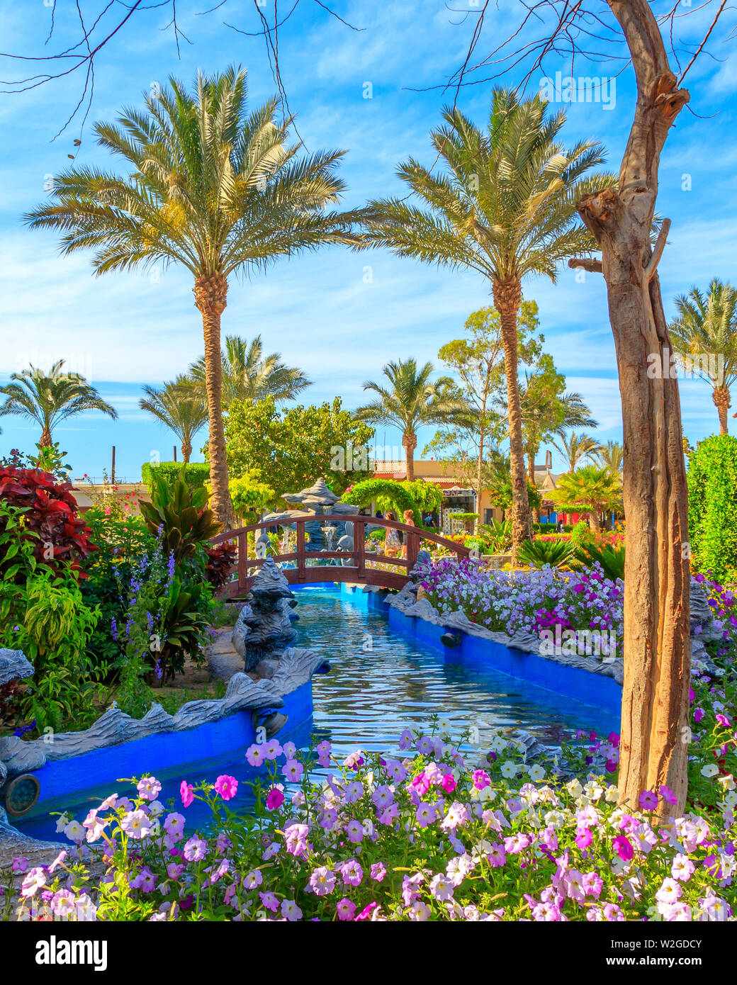 Hurghada, Egypt - April 17, 2019: Pictures of a water pool with bridge ...