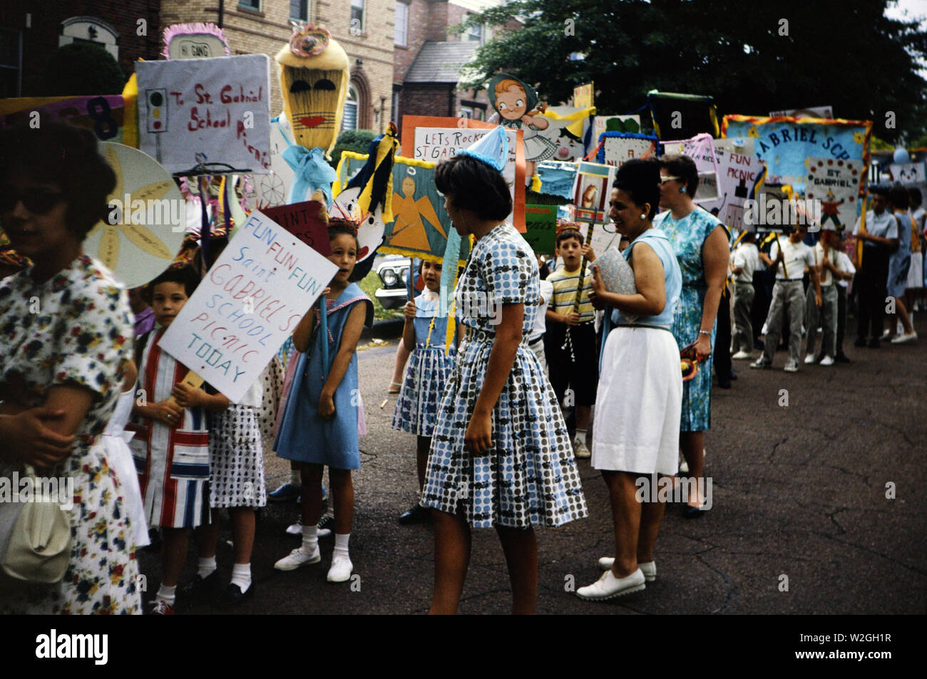 Children marching in an elementary school parade ca. 1963 Stock Photo ...