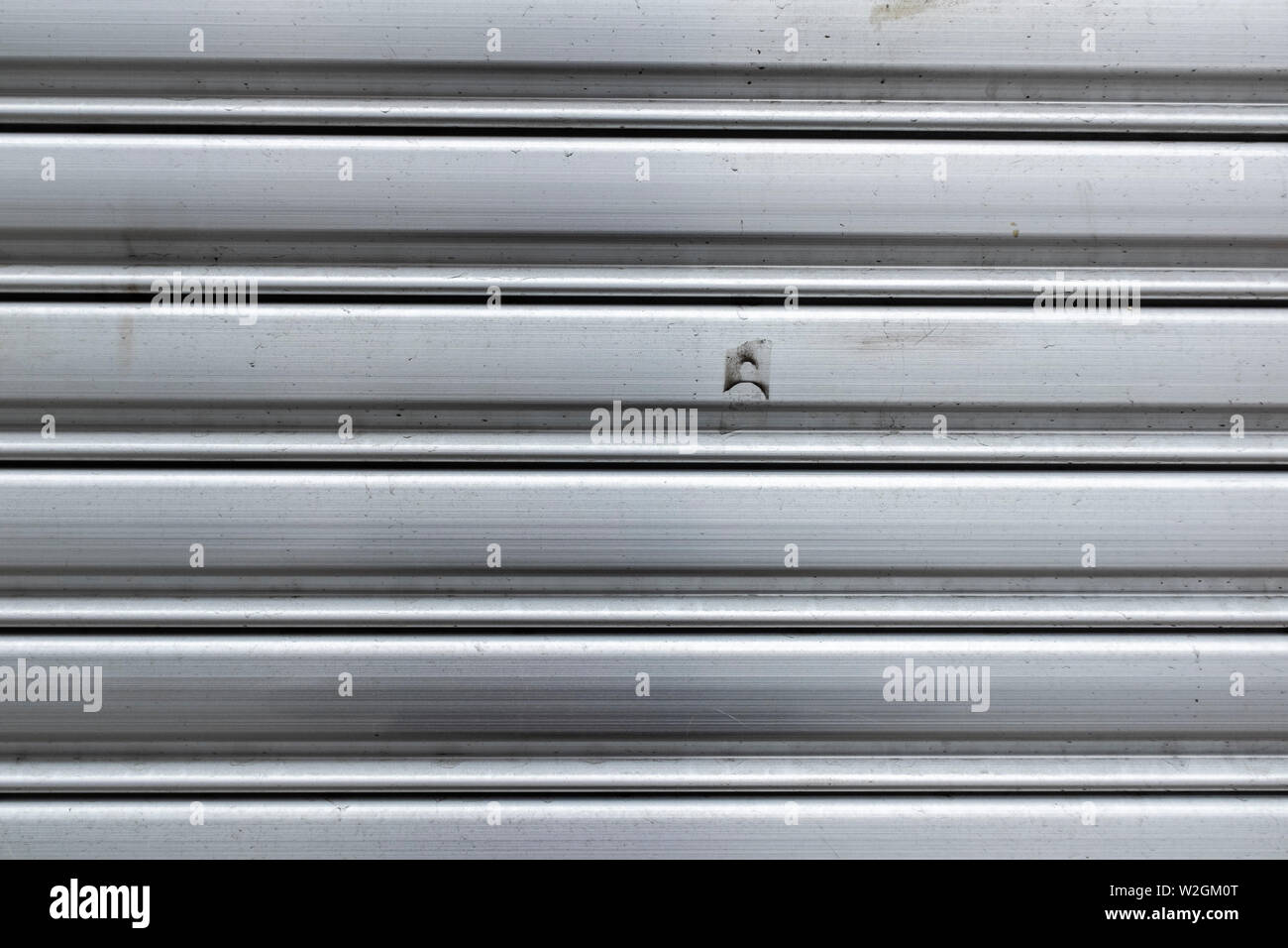 A detailed shot of a closed steel garage door Stock Photo - Alamy