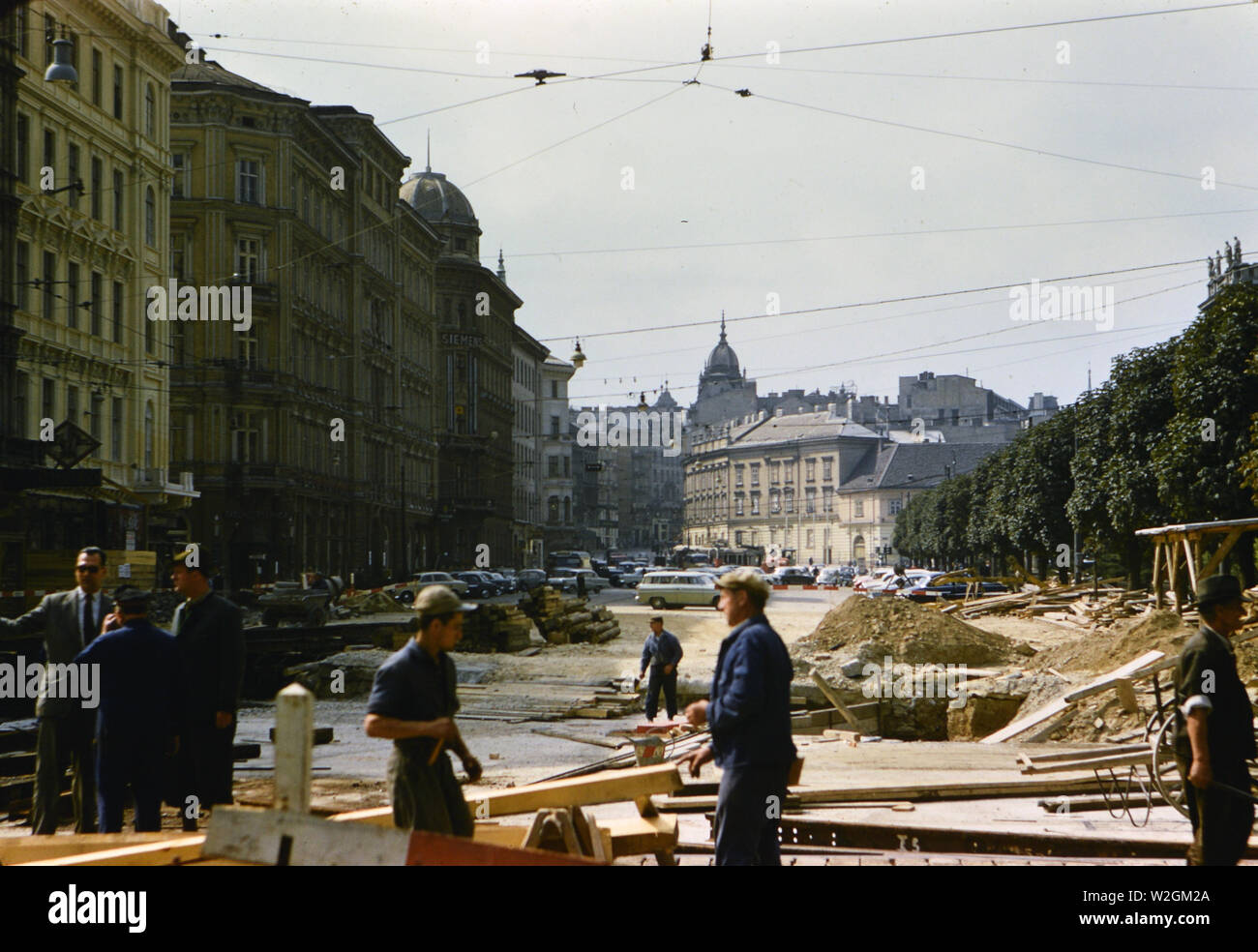 Road construction workers in a major European city ca. 1960 (possibly ...