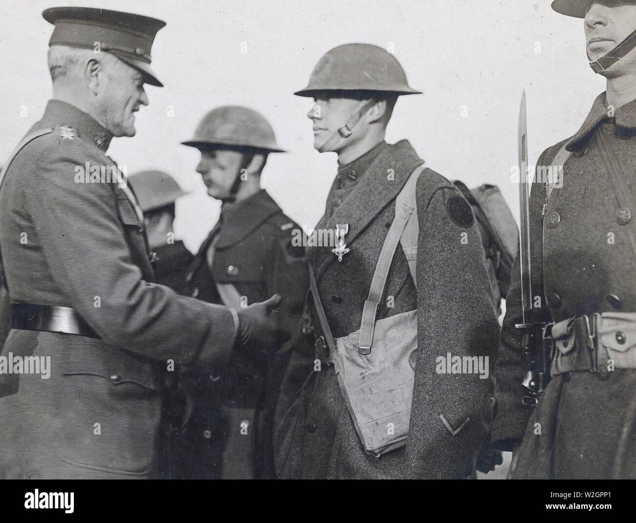 General John J. Pershing, Commander in Chief, A.E.F., decorating men of ...