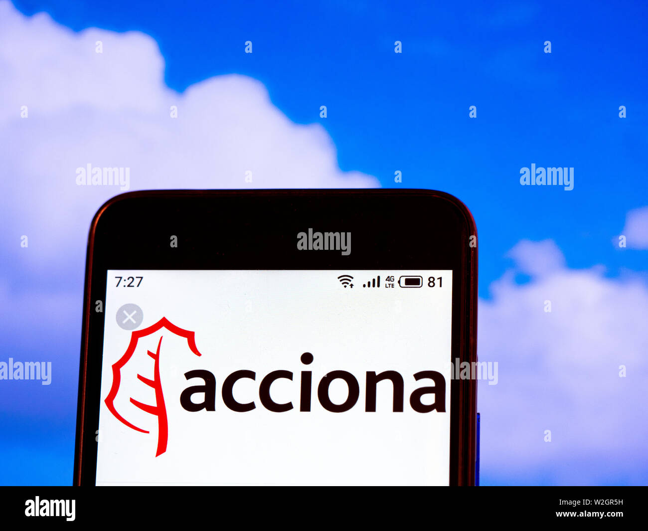 In this photo illustration the Acciona logo is seen displayed on a ...