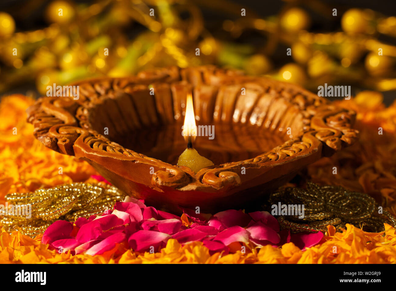 Close up of burning diwali diya Stock Photo - Alamy