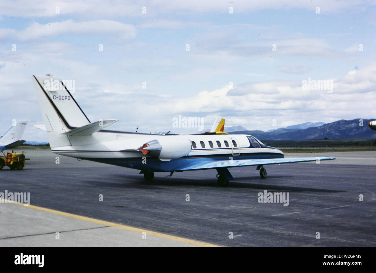 Small passenger jet on runway of an Alaska airport ca. 1983 Stock Photo ...