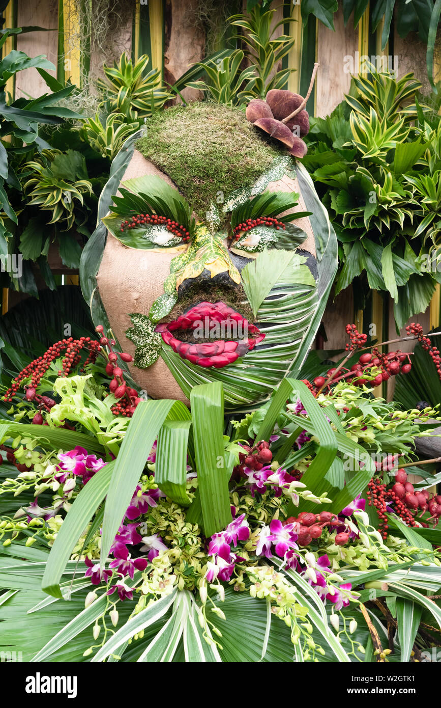 Face of leaves and flowers Stock Photo - Alamy