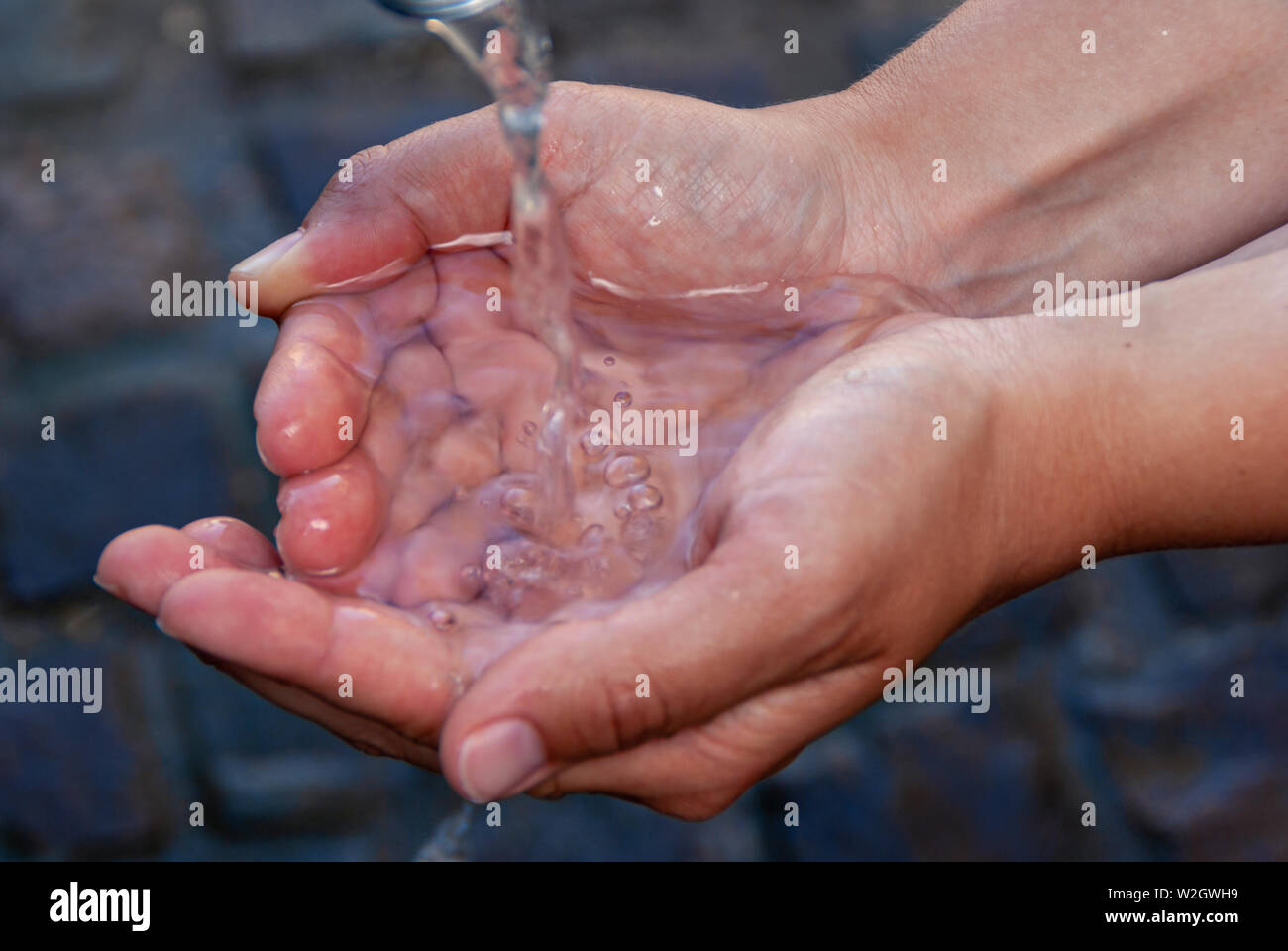 Hands scooping water hi-res stock photography and images - Alamy