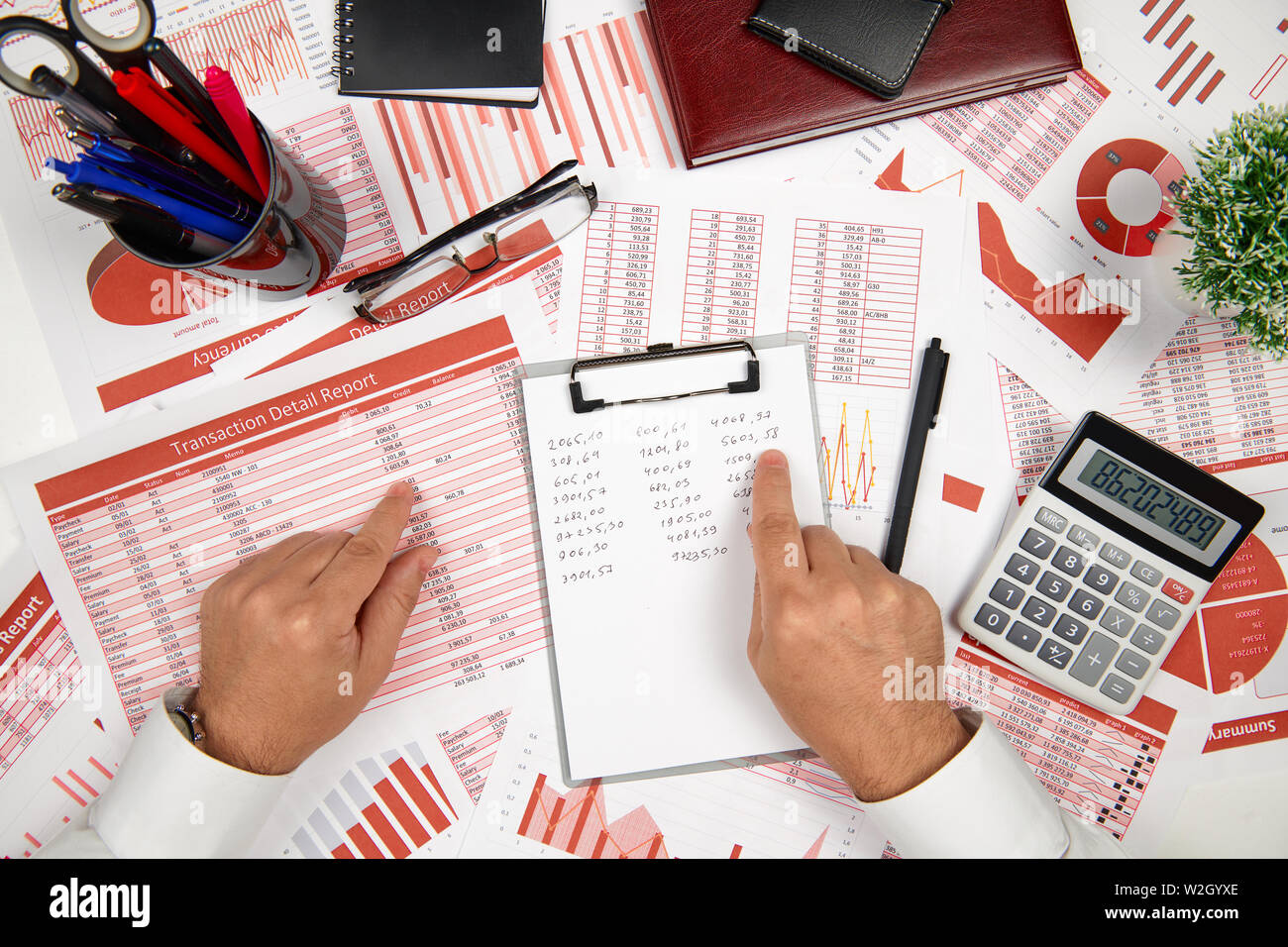 Business reports, data tables and charts - directly above view of ...