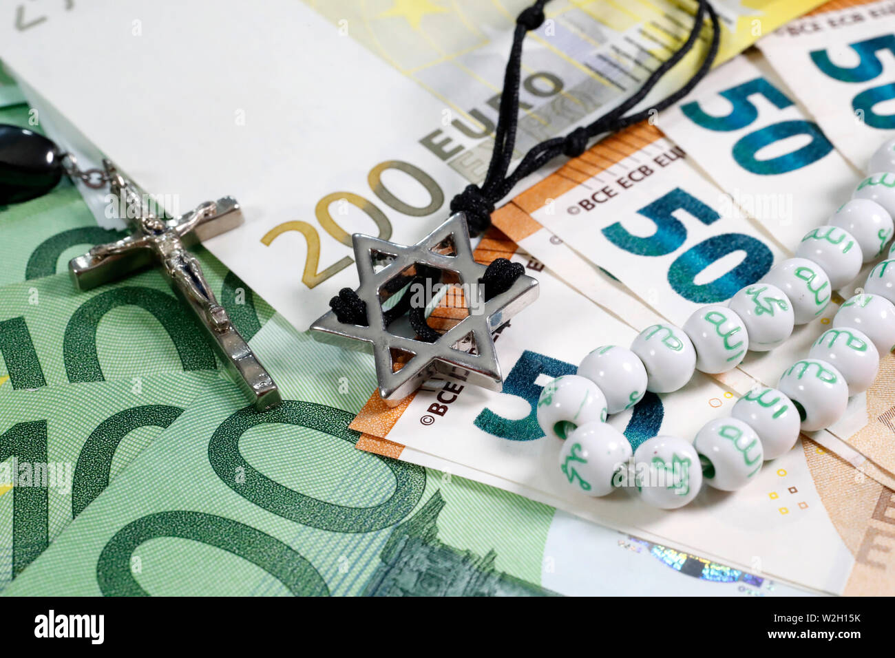 Banknotes of euro currency. Christianity, Islamic and Judaism finance ...