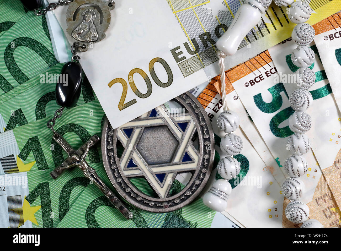 Banknotes of euro currency. Christianity, Islamic and Judaism finance ...