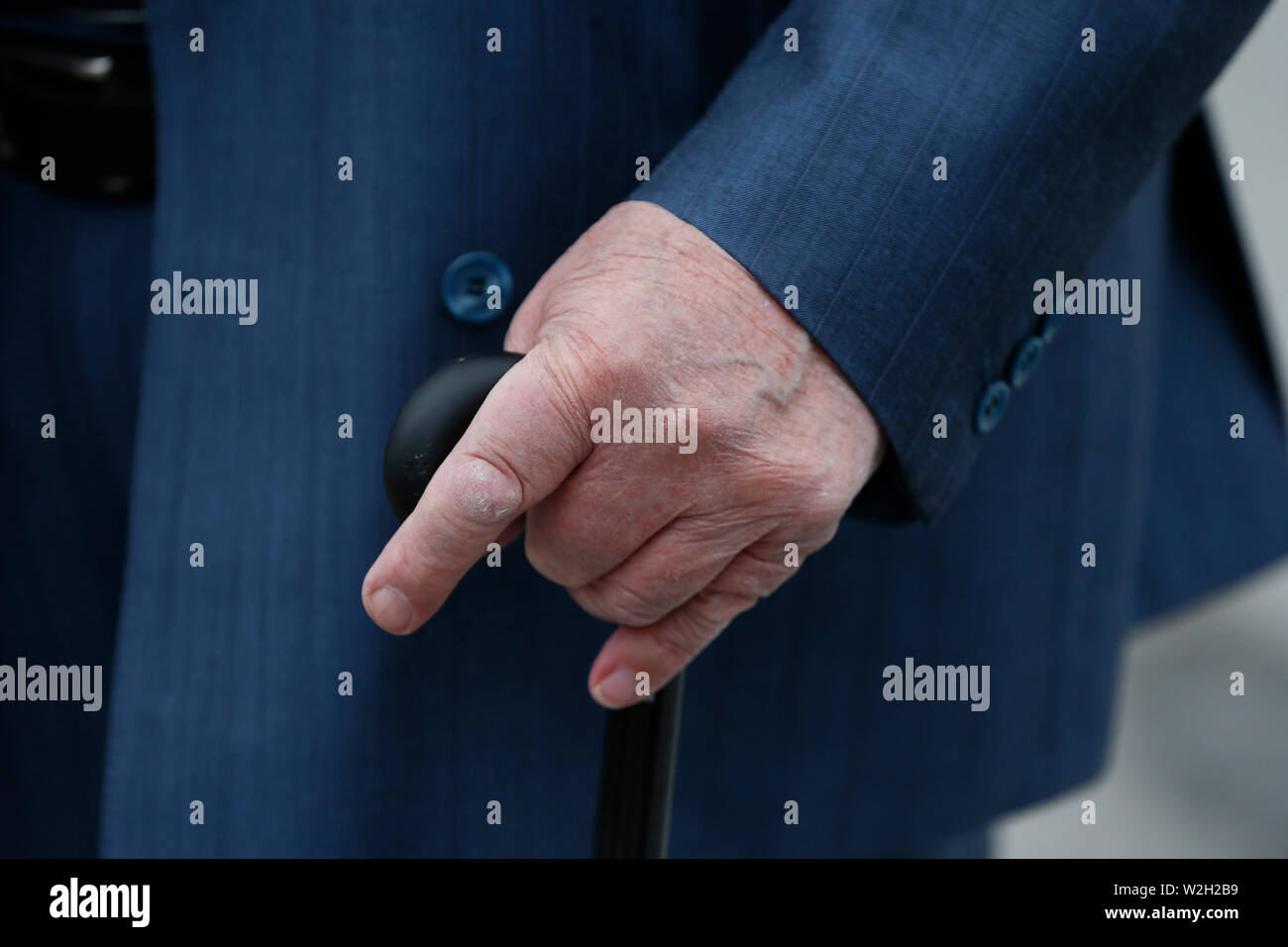 Senior man's hand leaning on cane. Close-up. France Stock Photo - Alamy