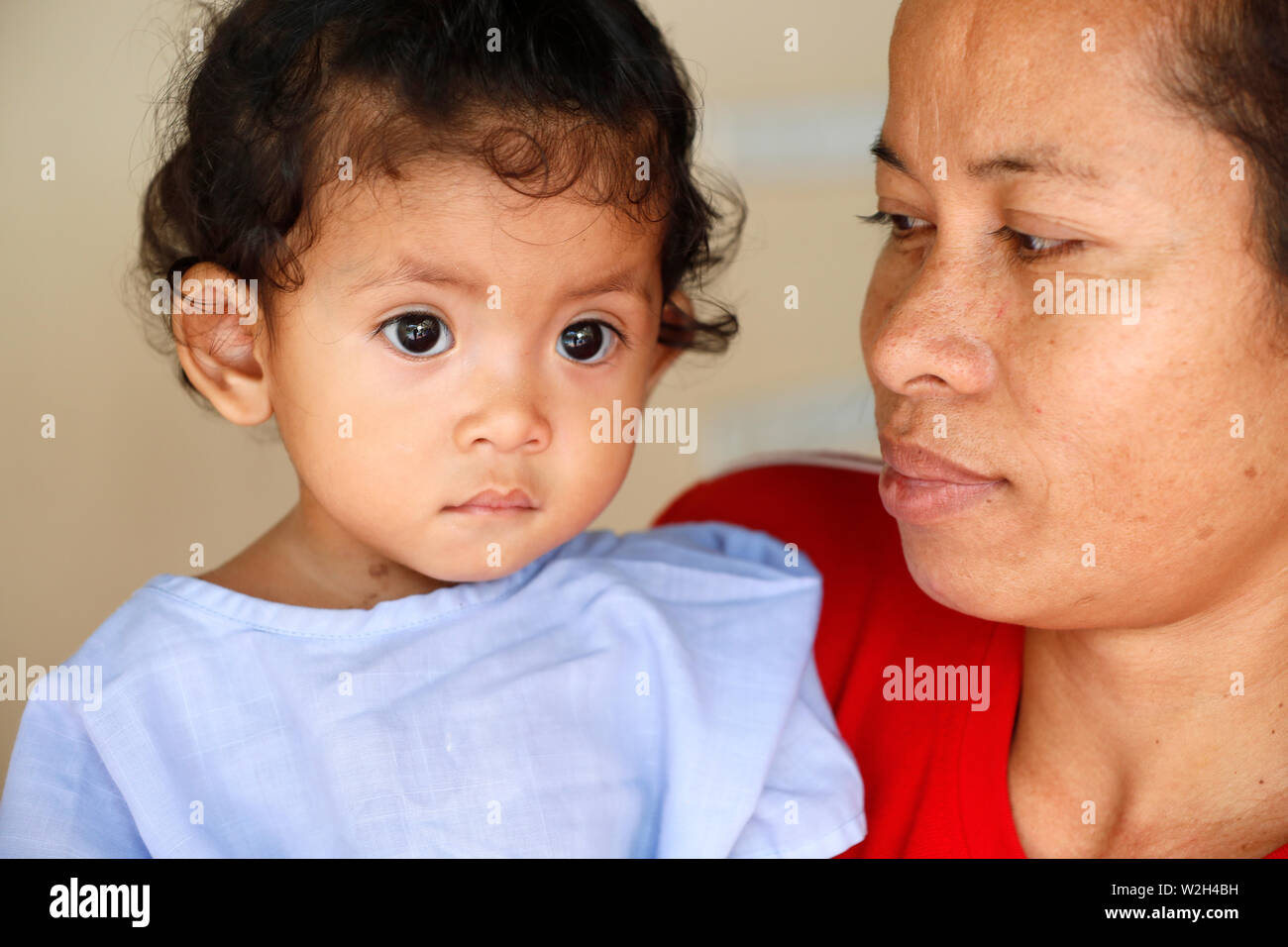Calmette Hospital. Cardiac surgery ward. Young girl with mother. Phnom ...