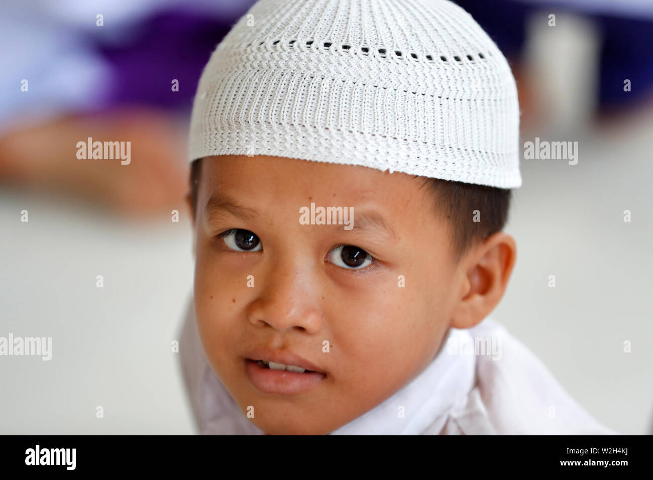 Nurunnaim mosque. Muslim boy at Islamic school. Portrait. Phnom Penh ...