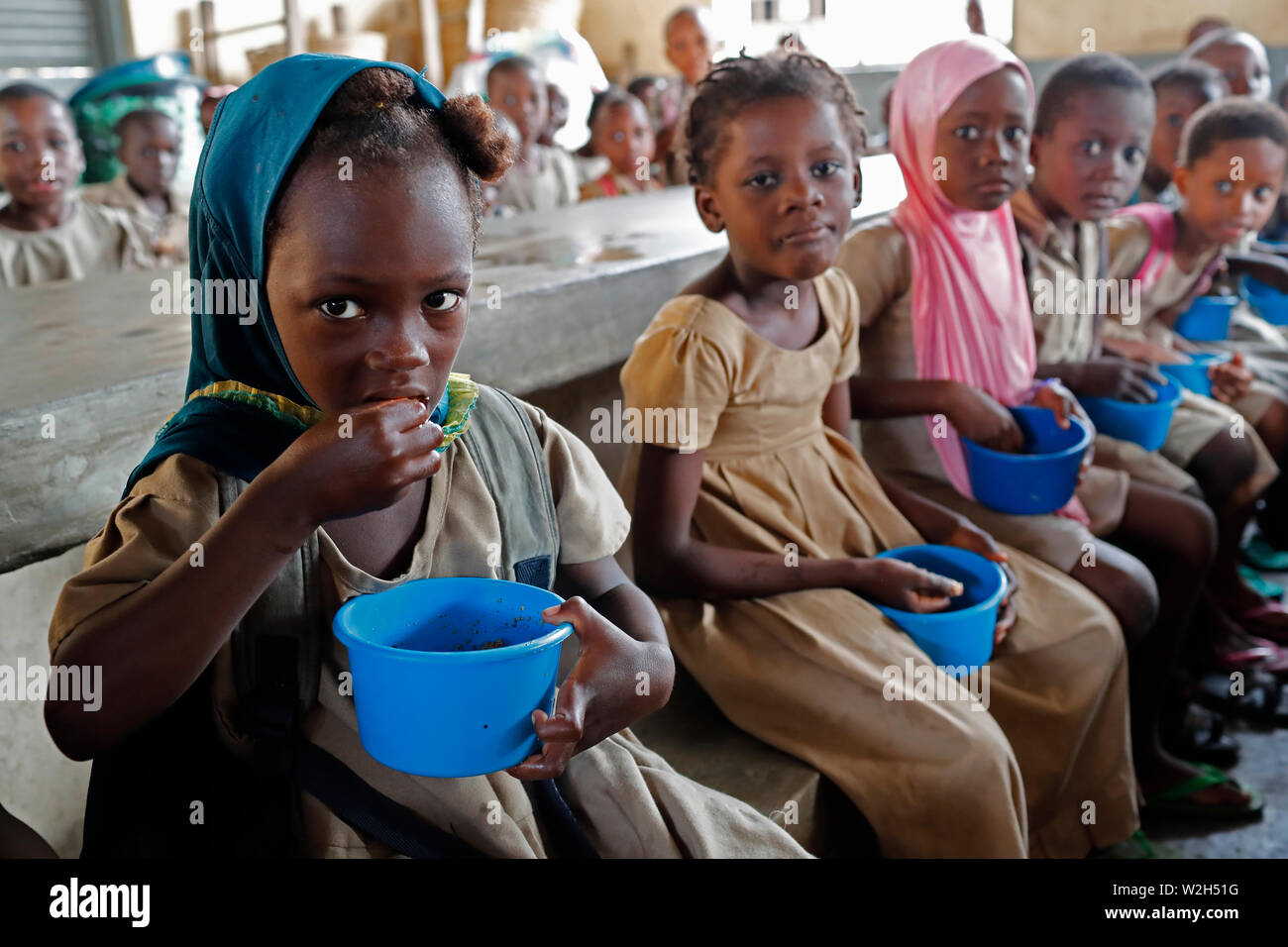 Food distribution in an African primary school. Lome. Togo Stock Photo ...