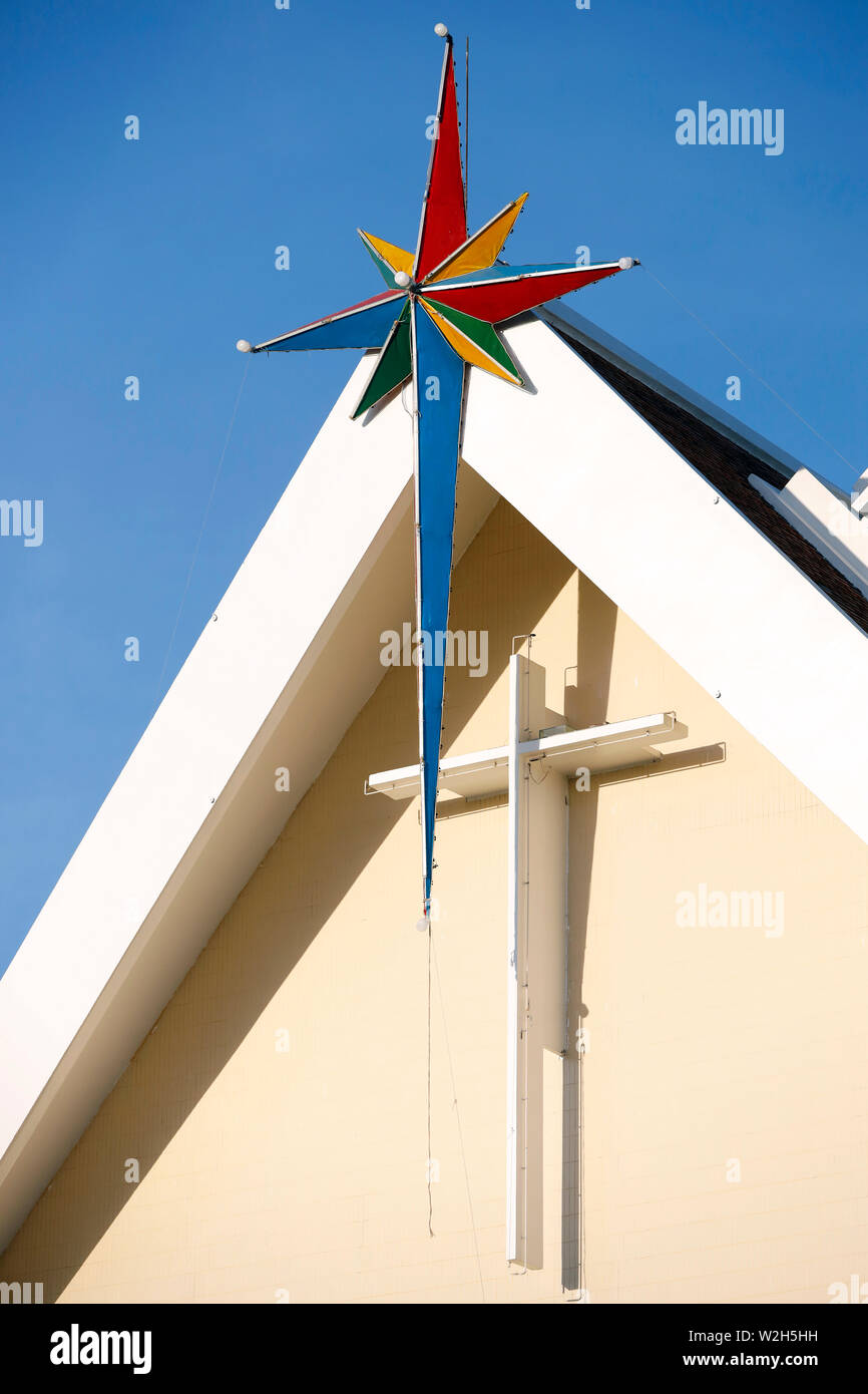 Star of Bethlehem and christian cross on a Catholic church ...