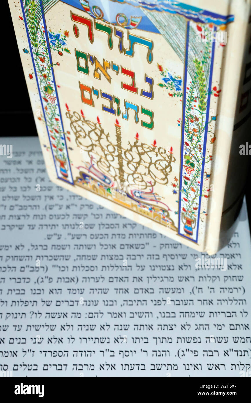 Paper Torah and digital Torah on tablet Stock Photo - Alamy