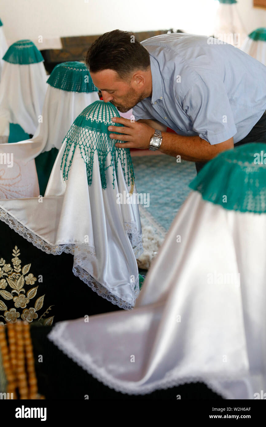 Saadi sufi tariqa tekke in Gjakova, Kosovo. Muslim kissing a tomb in ...