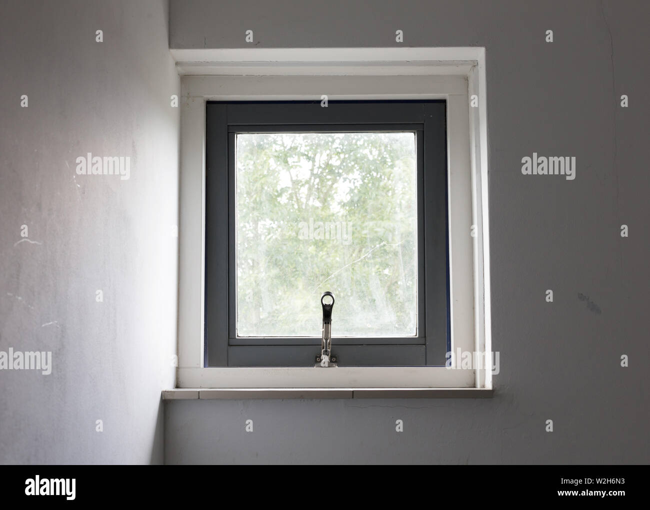 Small open window, view from inside to outside Stock Photo - Alamy