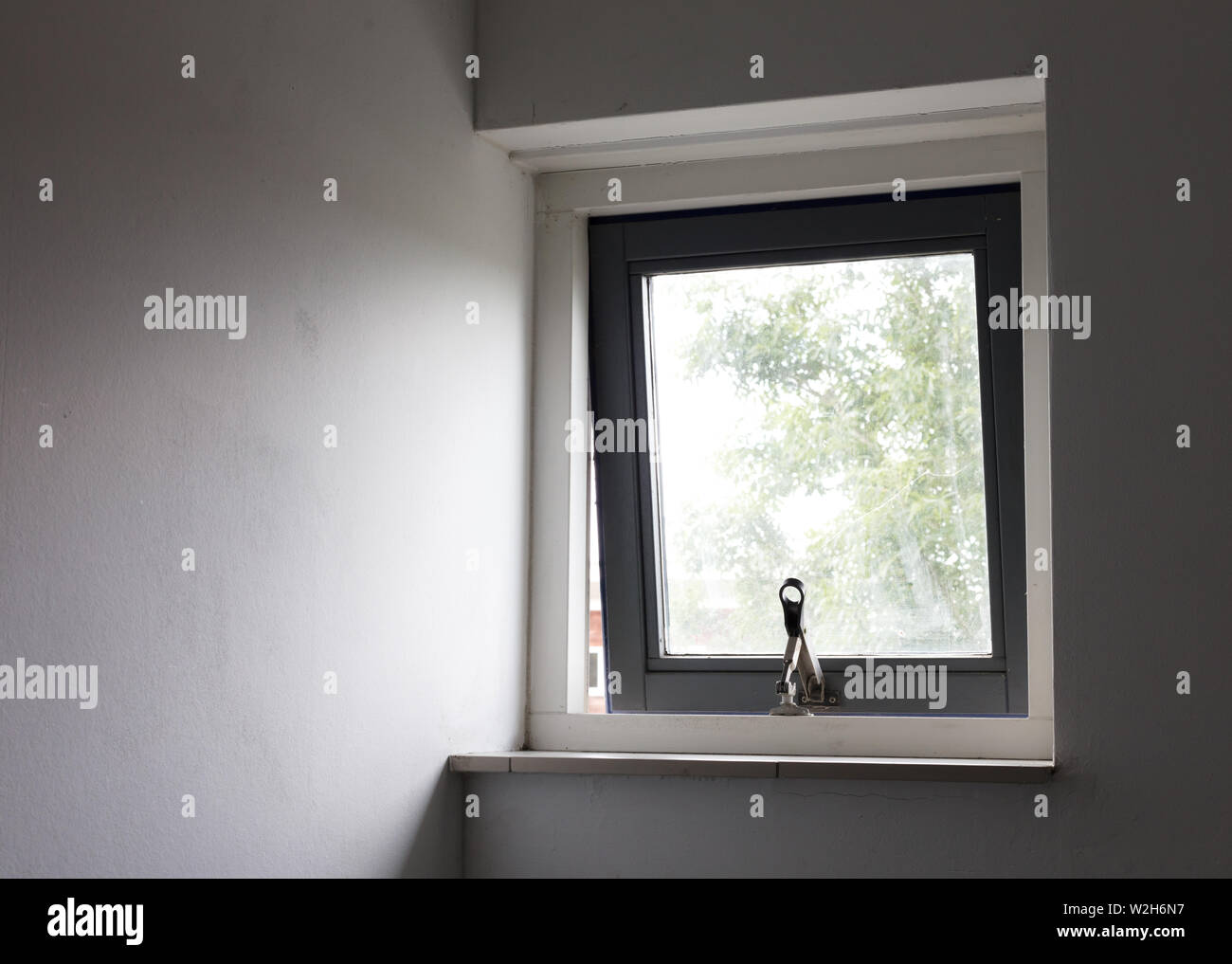 Small open window, view from inside to outside Stock Photo - Alamy