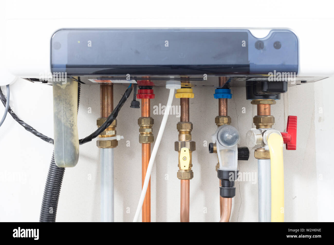 Home`s heating system, six tubes connected to the system, providing hot ...