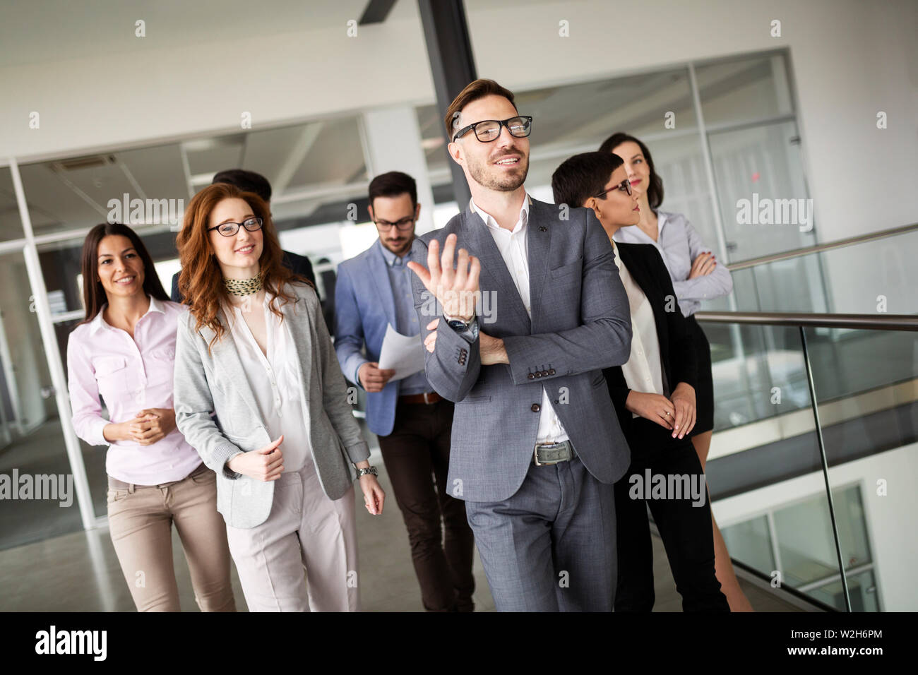Portrait of business people in offices representing company Stock Photo ...