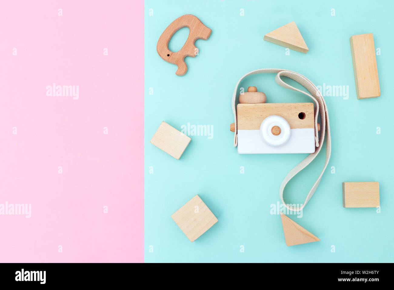 Kids wooden toys on pastels color background. Copy space Stock Photo ...